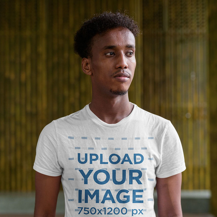 Placeit - Round-Neck Tee Mockup of a Serious Man Posing With a Cool ...