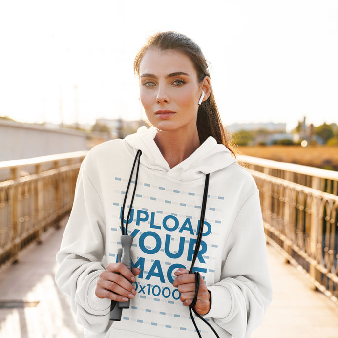 Placeit - Pullover Hoodie Mockup Featuring a Woman with a Jumping Rope