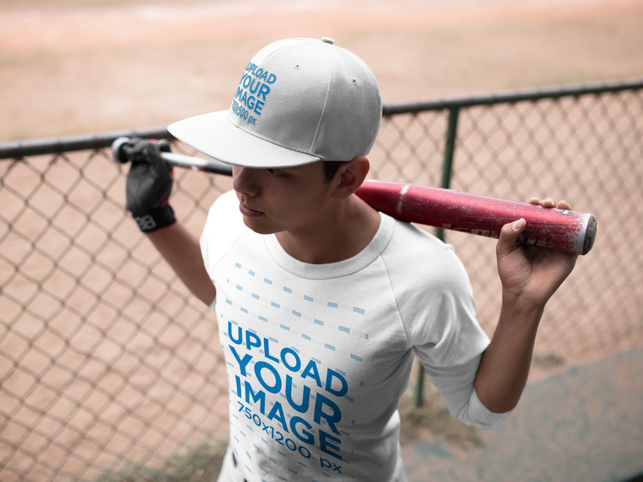 Placeit - Baseball Boy Wearing a Hat Mockup and Jersey Before the Game