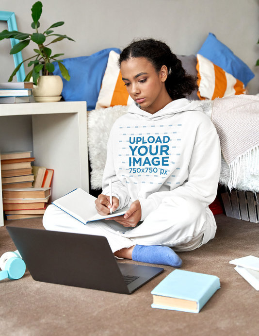 Placeit - Hoodie Mockup Featuring a Young Female Student at Home