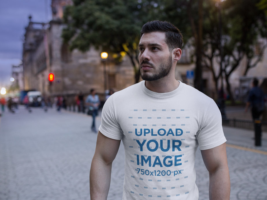 Placeit - Handsome Buff Man Wearing a Round Neck T-Shirt Mockup While ...