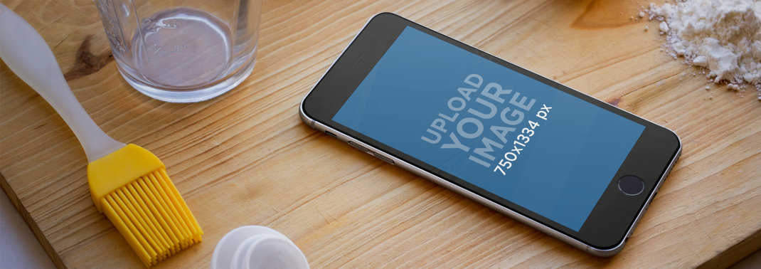 Placeit - Wide Mockup of an iPhone 6 on Kitchen Counter