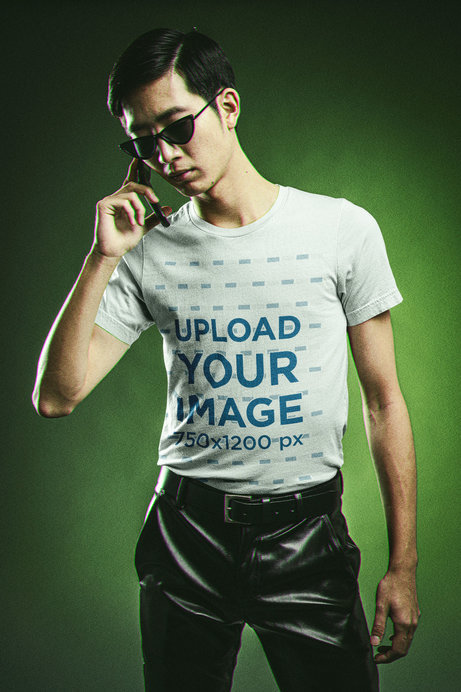 Placeit - T-Shirt Mockup Featuring a Man in a Matrix-Inspired Outfit ...