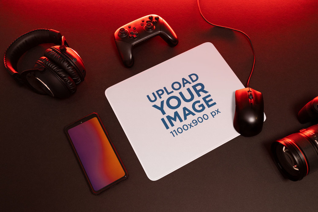 Placeit - Mockup of a Mouse Pad Surrounded by Diverse Technological Items