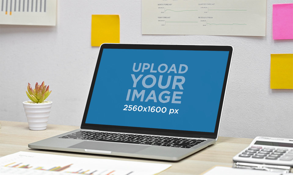 Placeit - MacBook Mockup Featuring Sticky Notes in The Wall