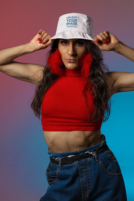 Placeit - Mockup of a Woman with Big Earrings Wearing a Bucket Hat