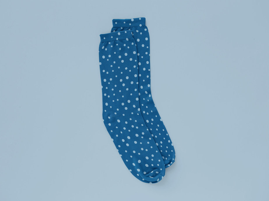 Placeit - Socks Mockup Featuring a Solid Color Background