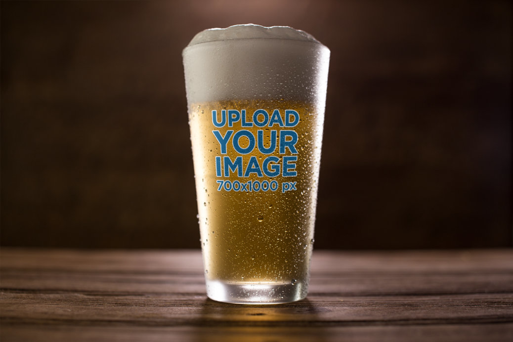 Placeit - Template of a Pint Beer Glass With Lager on a Wooden Surface