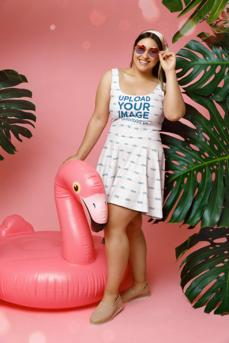 Placeit - Mockup of a Woman Wearing a Skater Dress Next to a Flamingo ...