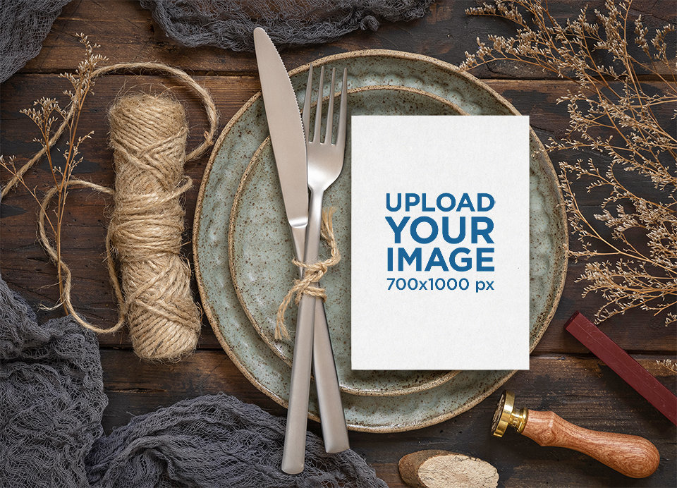 Placeit - Mockup of a Wedding Program Placed on a Table Setting