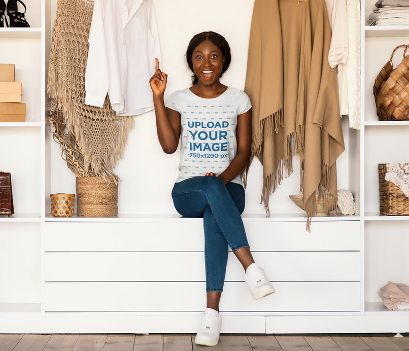 Placeit - T-Shirt Mockup of a Happy Woman with a Eureka Expression