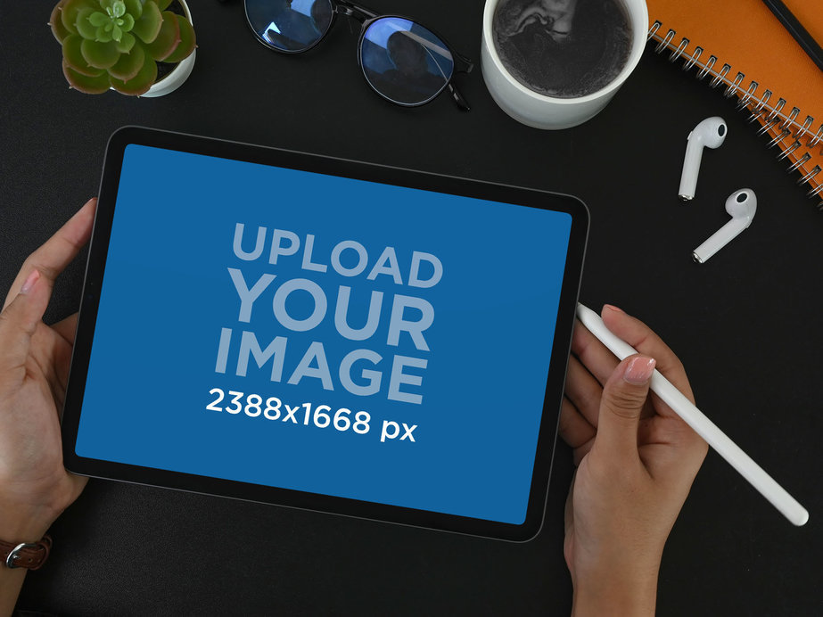 Placeit - Mockup of a Woman Holding an iPad Featuring a Pair of Earphones