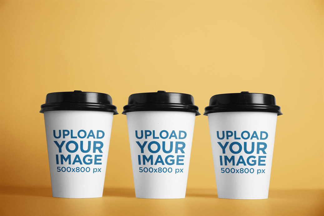 Placeit - Mockup of Three Paper Cups Aligned Next to Each Other