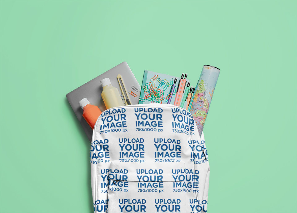 Placeit - Mockup of a Backpack With School Supplies Inside