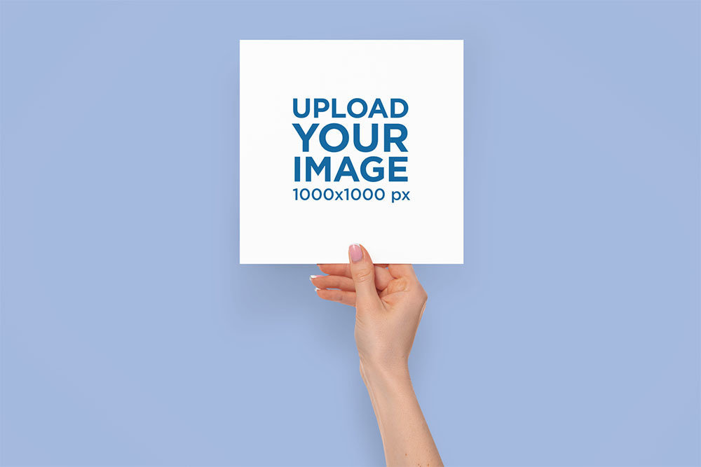 Placeit - Mockup of a Woman's Hand Holding a Squared Flyer