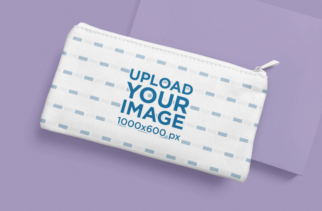 Placeit - Mockup of a Pouch Placed on a Colorful Surface