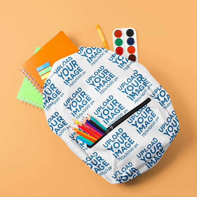 Placeit - Mockup of a Sublimated Backpack Full of School Items