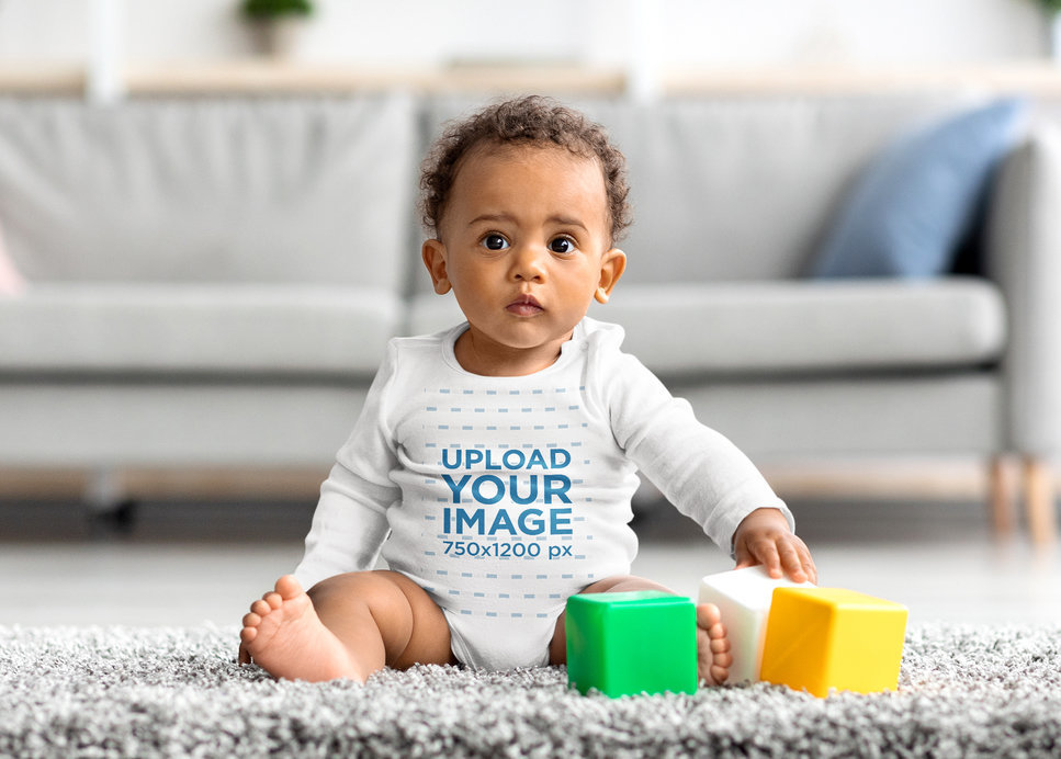 Placeit - Onesie Mockup Featuring a Cute Baby Playing with Colorful ...
