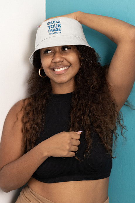 Placeit - Mockup of a Happy Woman Wearing a Bucket Hat