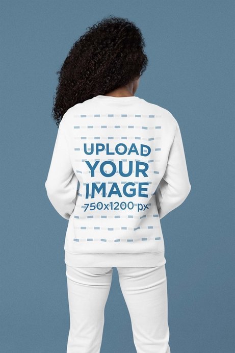 Placeit - Back-View Mockup of a Woman Posing with a Sweatshirt at a Studio