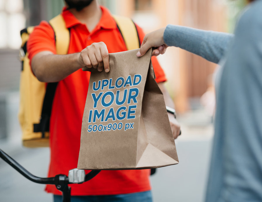 Placeit - Mockup of a Woman Receiving a Paper Bag