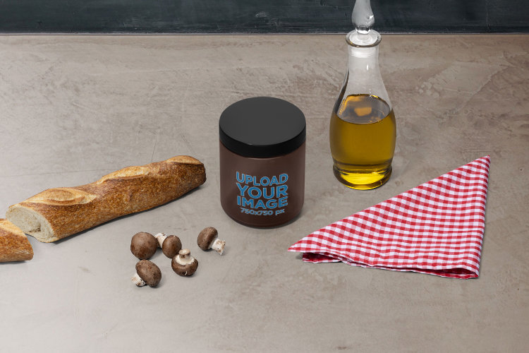 Placeit - Mockup of an Amber Jar Placed Next to Italian Food