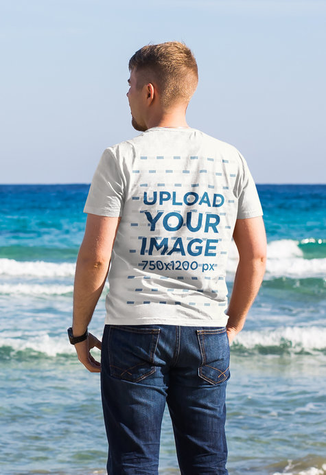 Placeit - Back-View Tee Mockup of a Man Standing on the Beach