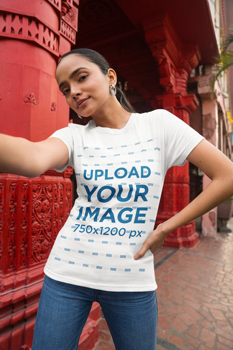 Placeit - Gildan Tee Mockup Featuring a Smiling Woman Taking a Selfie