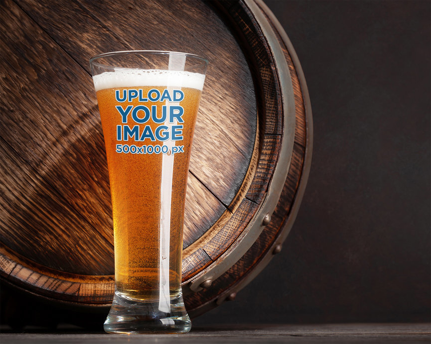 Placeit - Mockup of a Beer Glass Placed in Front of a Wooden Barrel