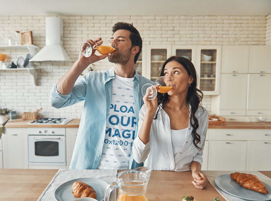 Placeit - Round-Neck Tee Mockup of a Cute Couple Drinking an Orange Juice