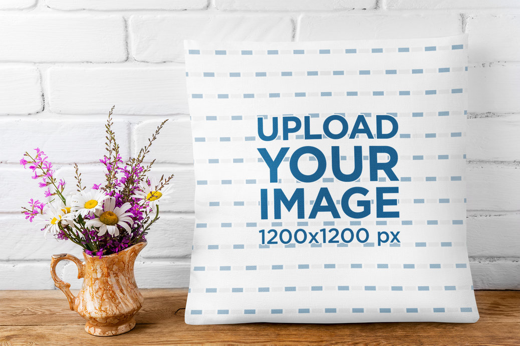 Placeit - Mockup of a Sublimated Squared-Shaped Pillow Placed Next to ...