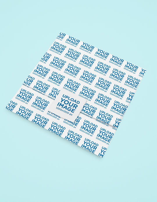 Placeit - Mockup of a Folded Wrapping Paper With a Sticker