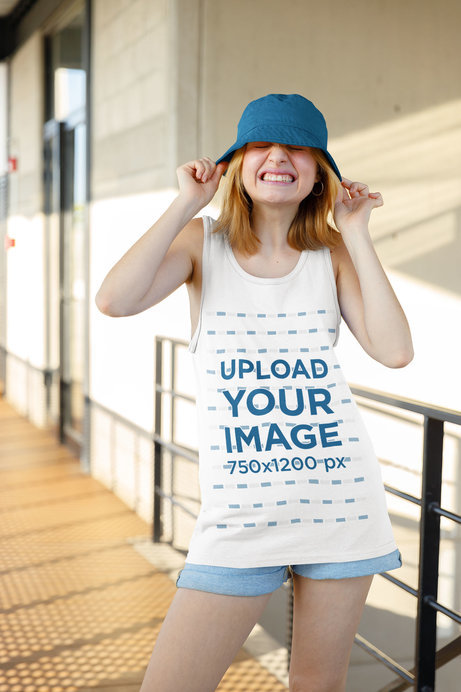Placeit - Tank Top Mockup of a Woman Doing a Funny Smiling Face