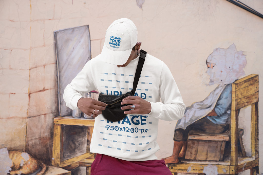 Placeit - Dad Hat and Sweatshirt Mockup of a Young Man Carrying a Fanny ...