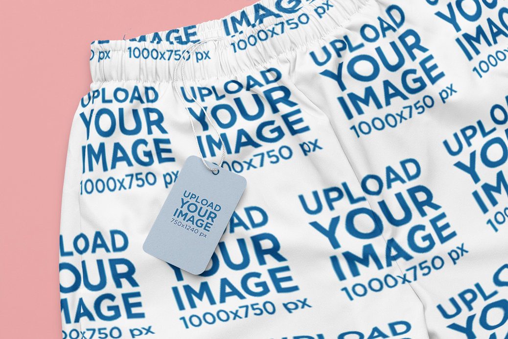 Placeit - Mockup of a Brand Tag Placed on Sublimated Shorts