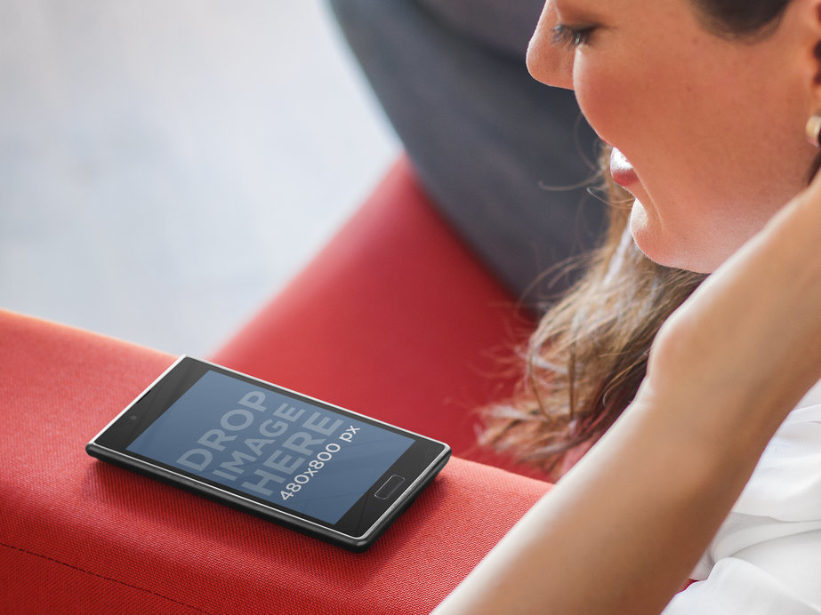 Placeit - Mockup of a Woman Using Her LG Phone at Home