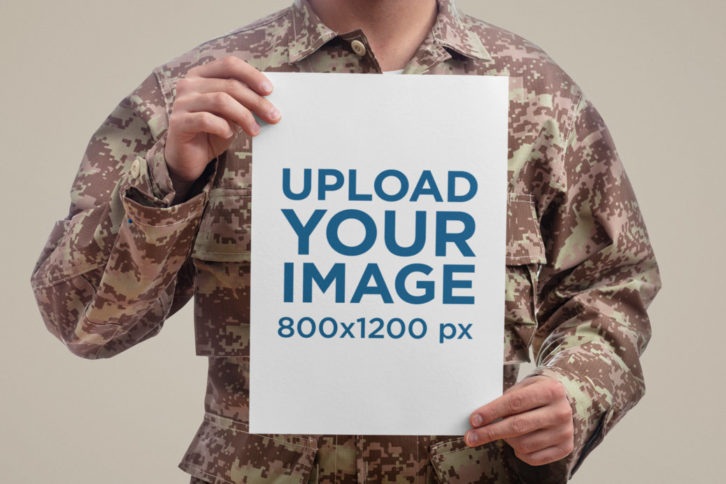 Placeit - Mockup of a Military Man Holding a Memorial Day-Themed Flyer