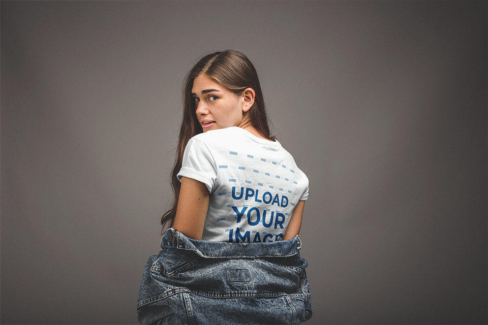 Placeit - Mockup from the Back of a Woman Removing her Denim Jacket in ...