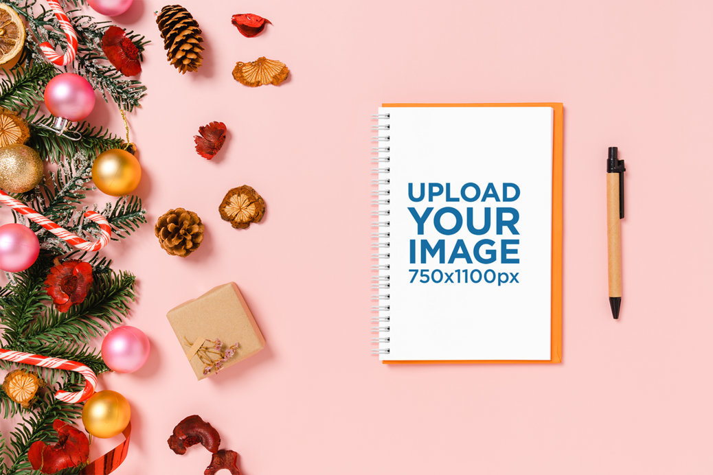 Placeit - Notebook Mockup Featuring a Christmas-Themed Setting