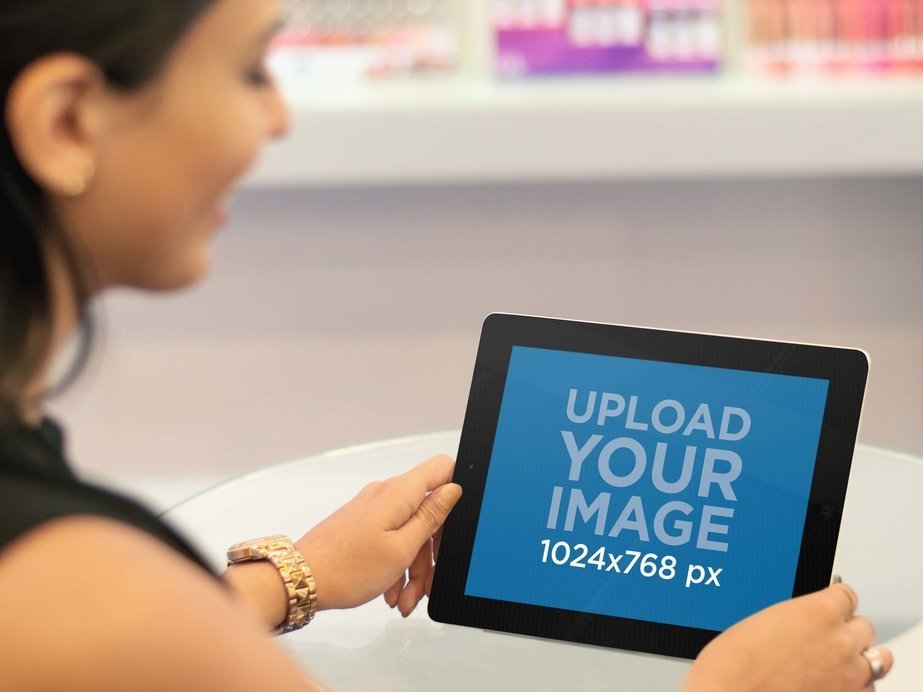 Placeit - Mockup of a Smiling Woman Using an iPad