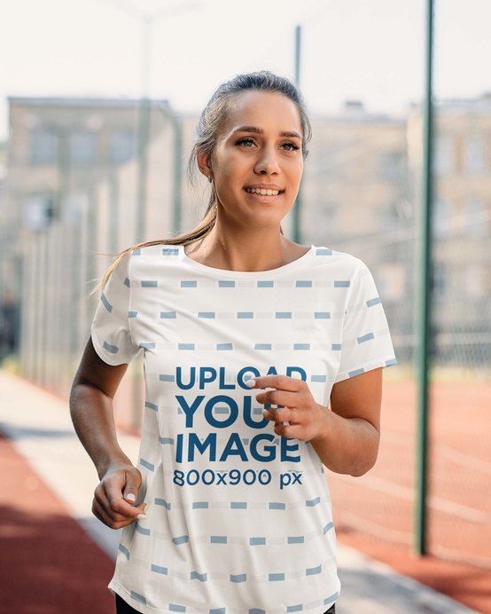 Placeit - T-Shirt Mockup Featuring a Smiling and Fitness Woman Doing a ...