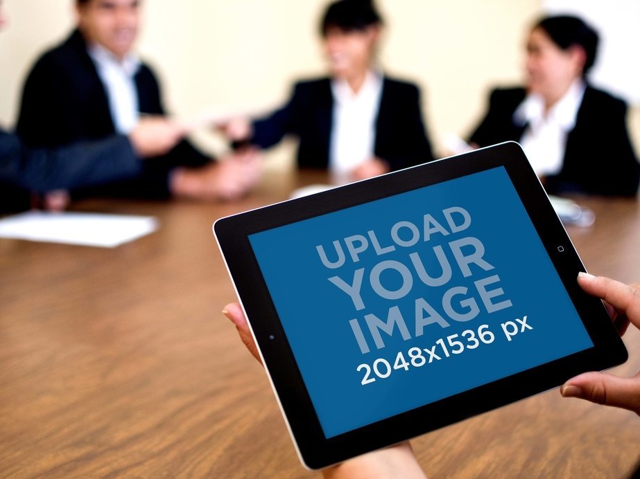 Placeit - iPad Mockup Featuring a Man in a Work Meeting