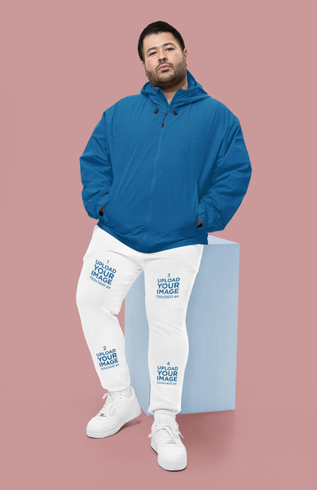 Placeit - Sweatpants Mockup Featuring a Man Leaning Against a ...