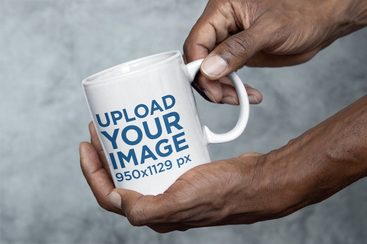 Placeit - Mockup of an 11 oz Coffee Mug Being Held by a Man