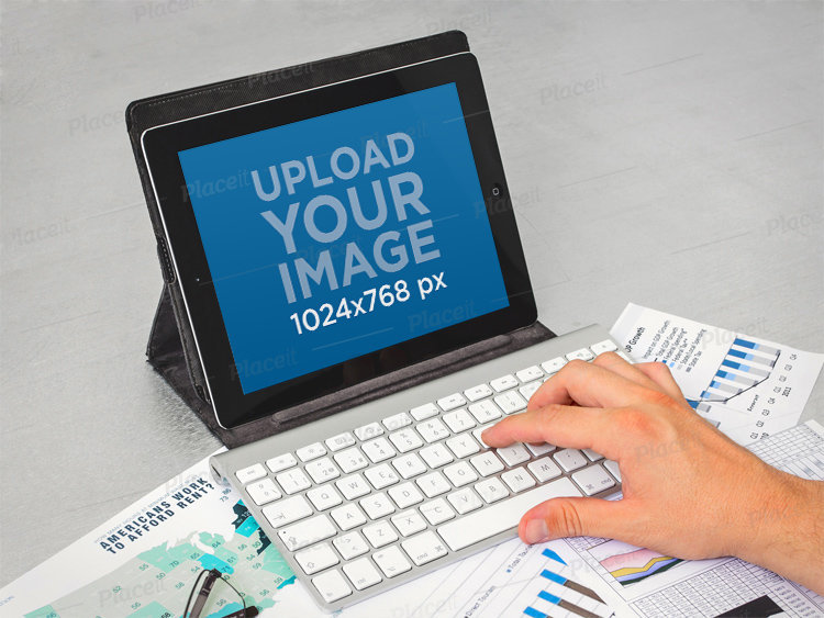 Placeit - Mockup of a Person Typing on an iPad