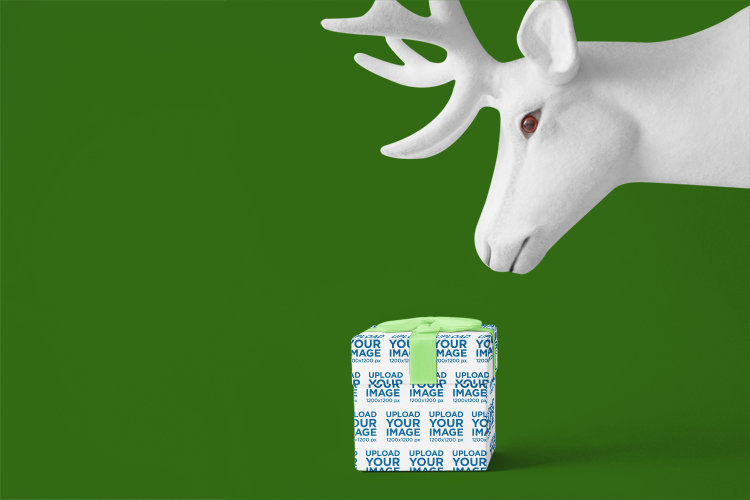 Placeit - Wrapping Paper Mockup Featuring a Small Present and a White ...