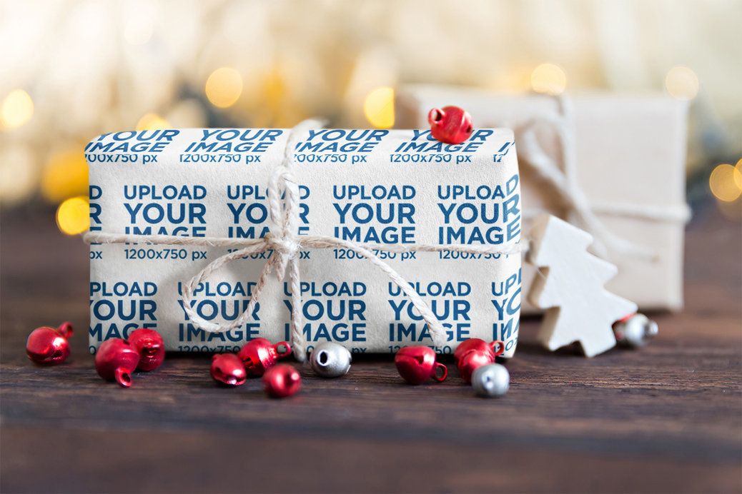 Placeit - Wrapping Paper Mockup of a Small Gift Surrounded by Christmas ...
