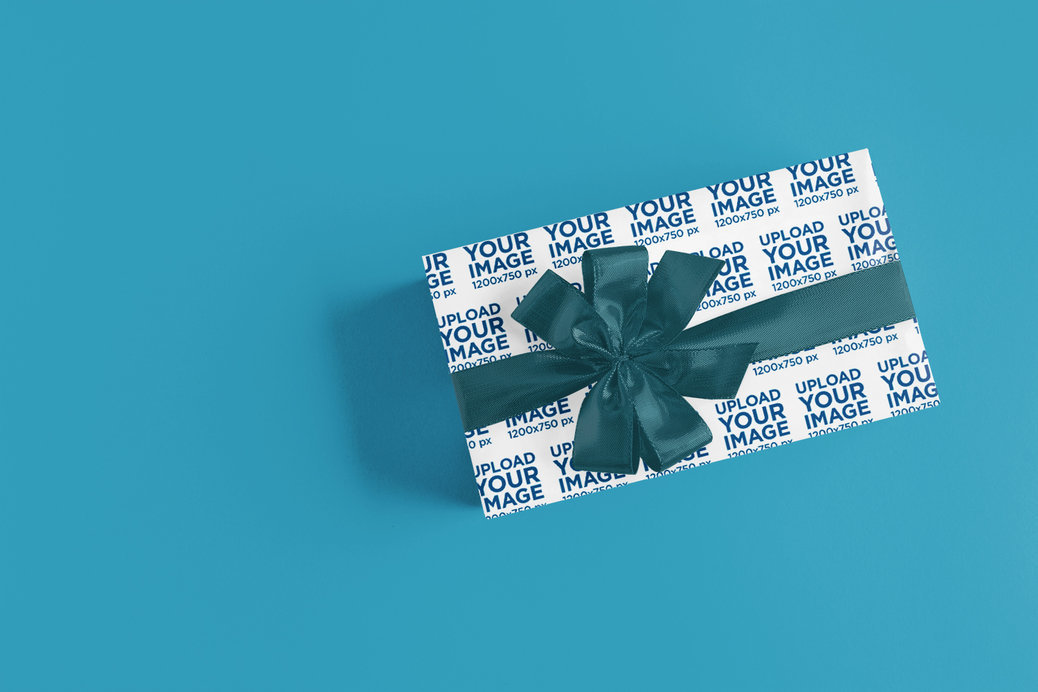Placeit - Wrapping Paper Mockup Featuring a Rectangular-Shaped Gift ...