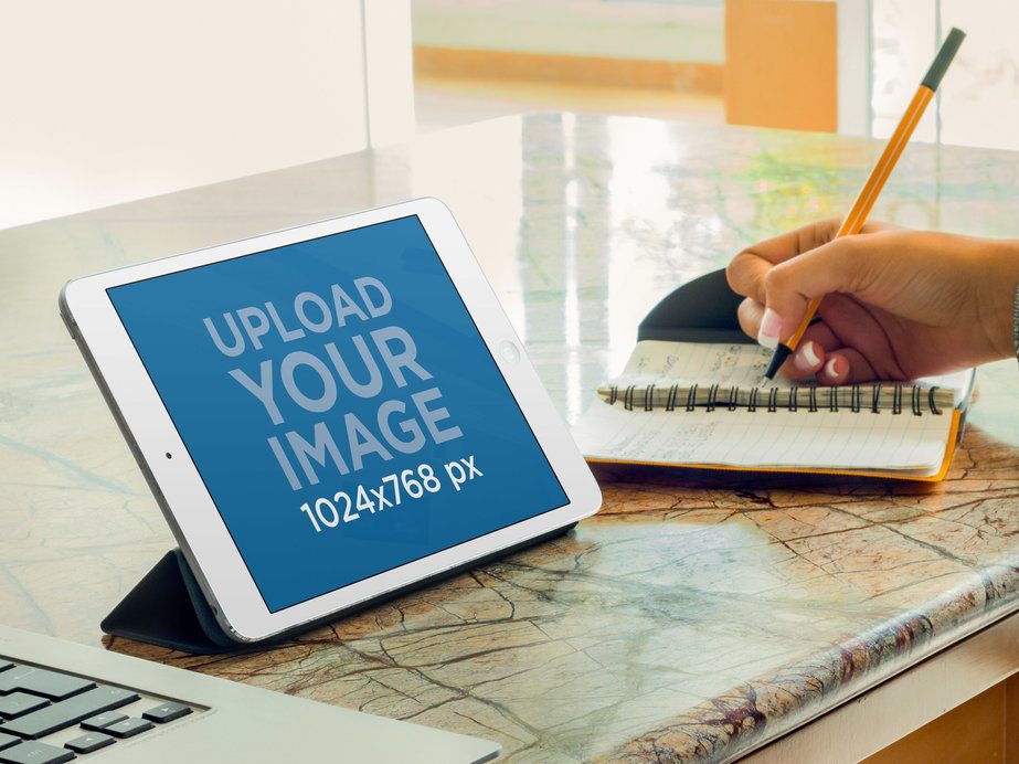 Placeit - iPad Mockup Template of Businesswoman Taking Notes