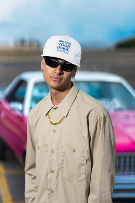 Placeit - Mockup of a Man with Piercings Wearing a Snapback Hat and ...